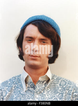 MIKE NESMITH of Monkees pop group with girlfriend and his open-top Mini ...