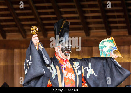 Kyoto, Yasaka shrine, Noh performance. Young Japanese woman kneeling ...