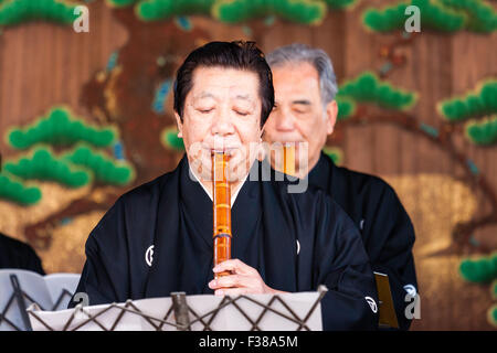 Yasaka shrine, Kyoto. Noh play. Japanese mature male Instrumentalist ...