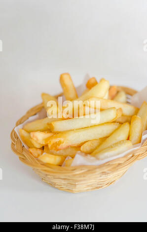 Traditional French fries in a bamboo basket Stock Photo - Alamy