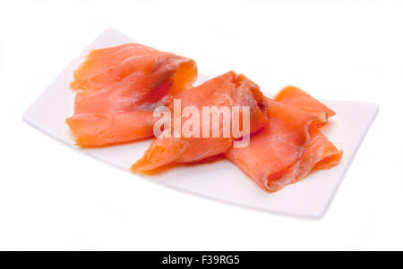 Smoked salmon on small tray on a white background seen close Stock ...