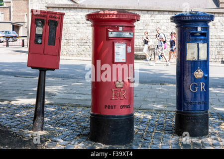 Windsor Berkshire traditional red pillar box alongside blue airmail ...