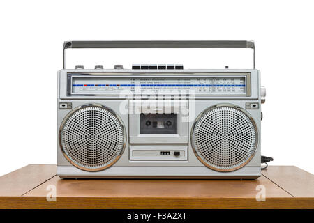 Vintage boombox on wood table with rustic cabin wood wall Stock Photo ...