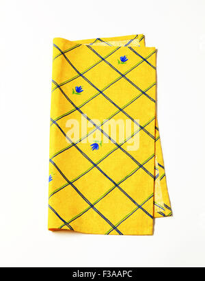 Yellow flower and napkin on the white plate Stock Photo - Alamy