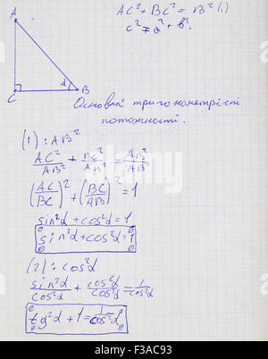 Squared paper with mathematical formulas Stock Photo - Alamy