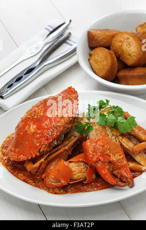 chilli mud crab with fried mantou, singapore cuisine Stock Photo - Alamy