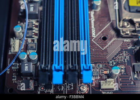 Closeup on empty RAM slots on a modern black silver motherboard. Ddr4 ...