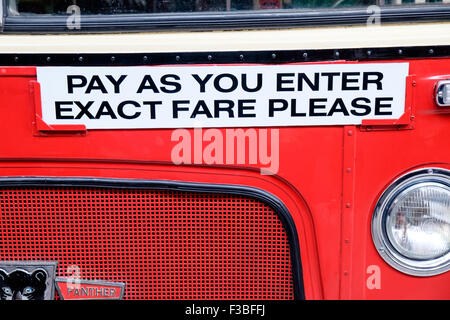 "Pay as you enter" bus sign Stock Photo - Alamy