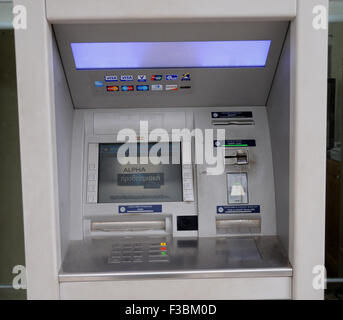 Greek Bank ATM. 24 hour cash machine outside a branch of Eurobank ...