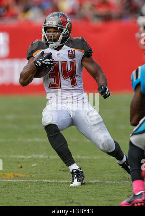 Tampa Bay Buccaneers defensive back Andrew Adams (26) looks to make a ...