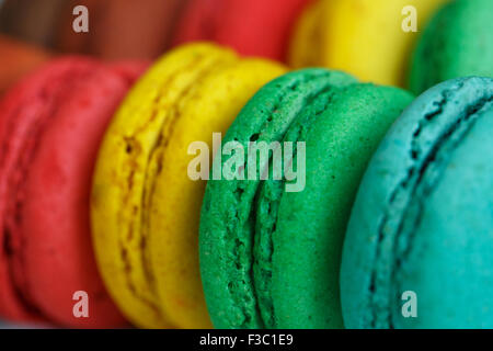Colourful tasty macaroons in a row Stock Photo - Alamy