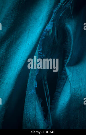 A piece of ripped silk fabric Stock Photo - Alamy