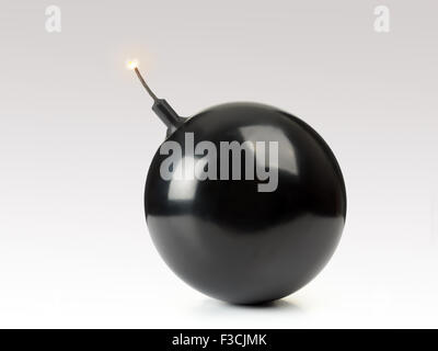 Sphere shaped bomb with burning fuse on black background, top view ...