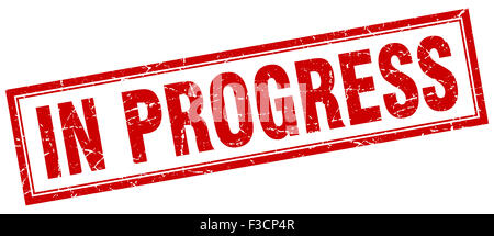 In progress square red grunge stamp Stock Photo - Alamy