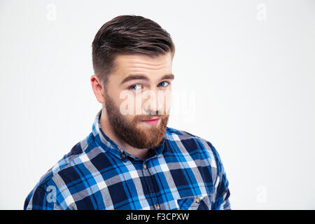 Handsome guy looking at camera with pretty girl kissing him Stock Photo ...