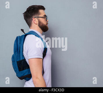 Cute and silly handsome male student pointing at himself and making ...