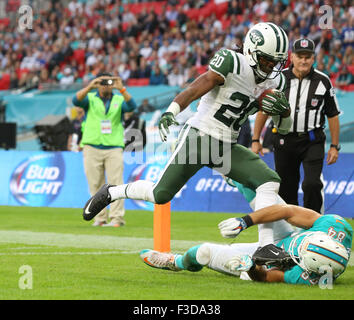 New York Jets cornerback Jordan Clark (33) celebrates after a tackle in ...
