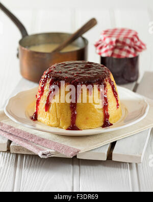 Steamed jam pudding. Traditional dessert UK Stock Photo - Alamy