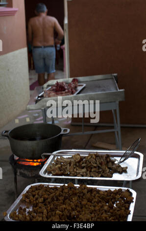 Cooking Cuban cuisine, chicharron, pork rind or pork scratchings on the ...
