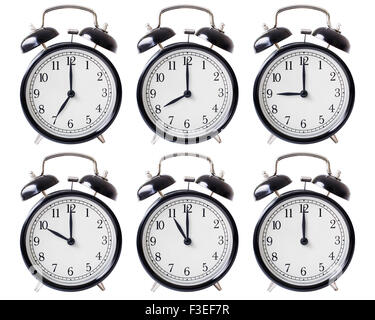 Vintage Analog Clock with hands set at 12:00. Antique alarm clock with ...