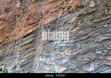 Layers of iron ore formed in the earth Stock Photo - Alamy