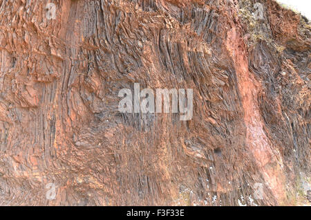Layers of iron ore formed in the earth Stock Photo - Alamy