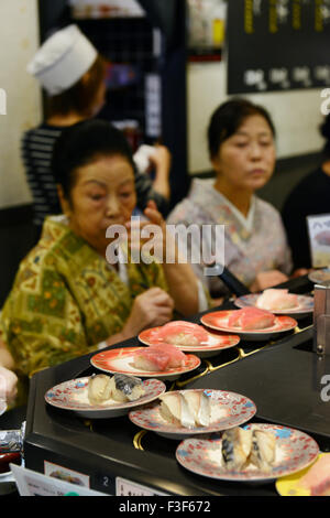 Traditional Revolving Sushi restaurant in Osaka, Japan Stock Photo - Alamy