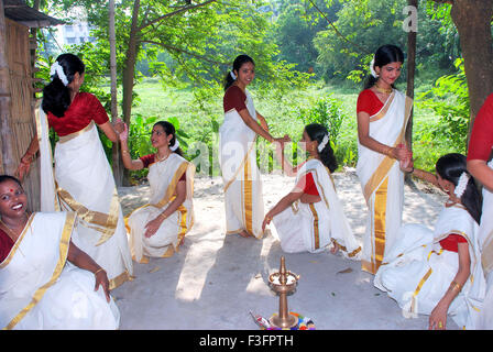 Women celebrating ; Onam Festival ; dancing ; Kaikottikali Dance ...
