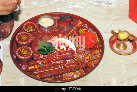 Pooja Samagri in thali Stock Photo - Alamy