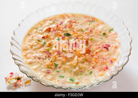 Grains flaked rice poha pawa mix in milk Stock Photo - Alamy