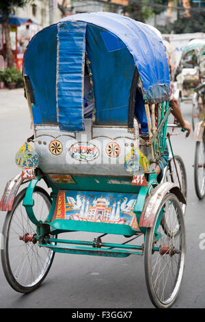 Blue color cycle rickshaw on the street, Dhaka, Bangladesh, Asia Stock ...