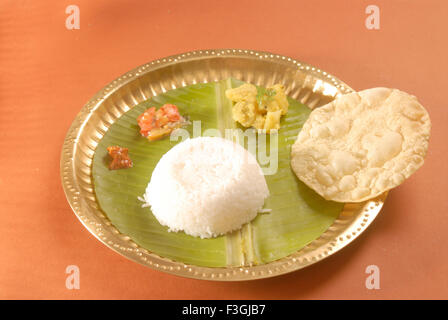 Vegetarian ; Indian food varan bhat rice pickles puri and curry on ...