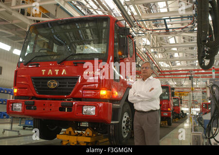 Managing Director, Tata Motors Ravi Kant, 3rd from left, speaks during ...