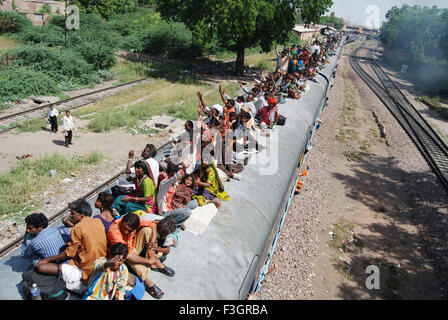 Overcrowded train with people on the roof on 18.01.2015 in Dhaka-Banani ...
