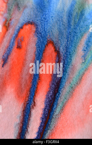 Dripping blue Ink on Paper under the microscope. The paper absorbs blue ...