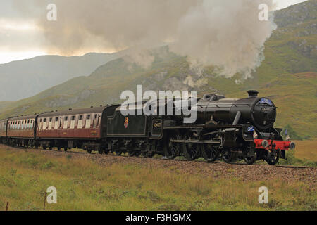 The Jacobite Steam Train traveling through the Scottish Highlands ...