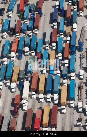 trucks lined up at container facility aerial view Stock Photo - Alamy