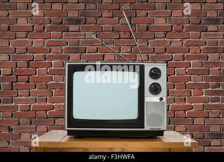 Old analogue television on wood table with static screen Stock Photo ...