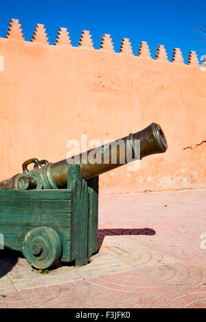 in africa morocco green bronze cannon and the blue sky Stock Photo - Alamy