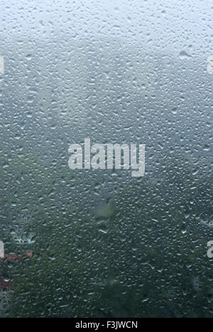 Rainwater on the window. Rain drops Stock Photo - Alamy
