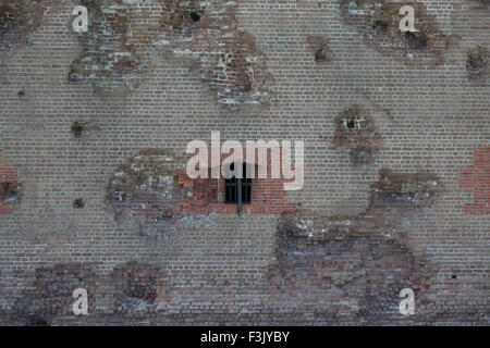 A photograph of a damaged outside wall at Fort Pulaski National ...