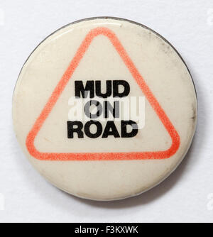 Mud on road traffic warning sign UK Stock Photo - Alamy