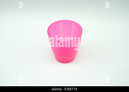pink plastic mug on white background Stock Photo - Alamy
