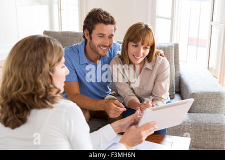 Real estate agent presenting property investment opportunity in office ...