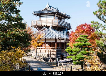 Japanese castle at Ikeda, near Osaka. The keep is constructed in the ...