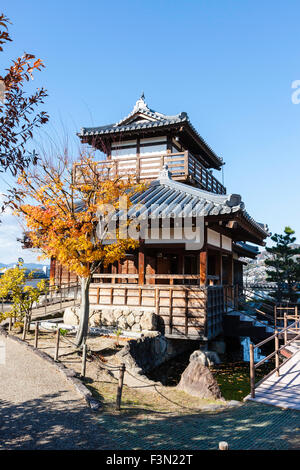 Japanese castle at Ikeda, near Osaka. The keep is constructed in the ...