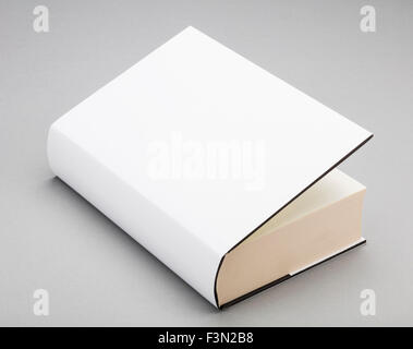 Thick Blank book with ajar white cover Stock Photo - Alamy