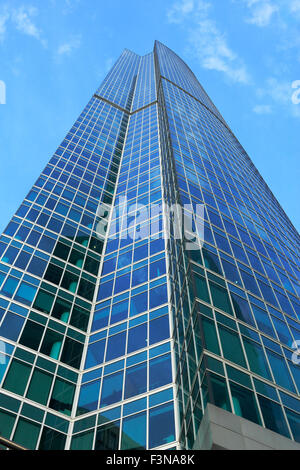 A low angle view of contemporary high rise residential towers featuring ...