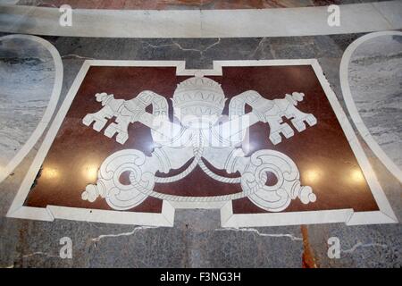 Papal seal on the floor in St. Peter's Basilica, Rome, Italy Stock ...