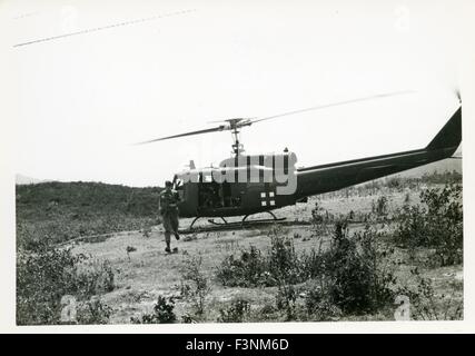 Wounded soldiers are loaded into a United States Army medevac dustoff ...